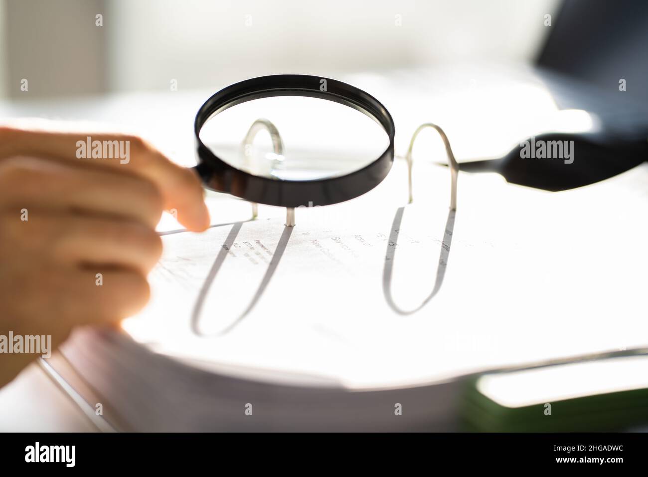 Lawyer Examining Paper Using Magnifier Glass. Tax Fraud Investigation ...