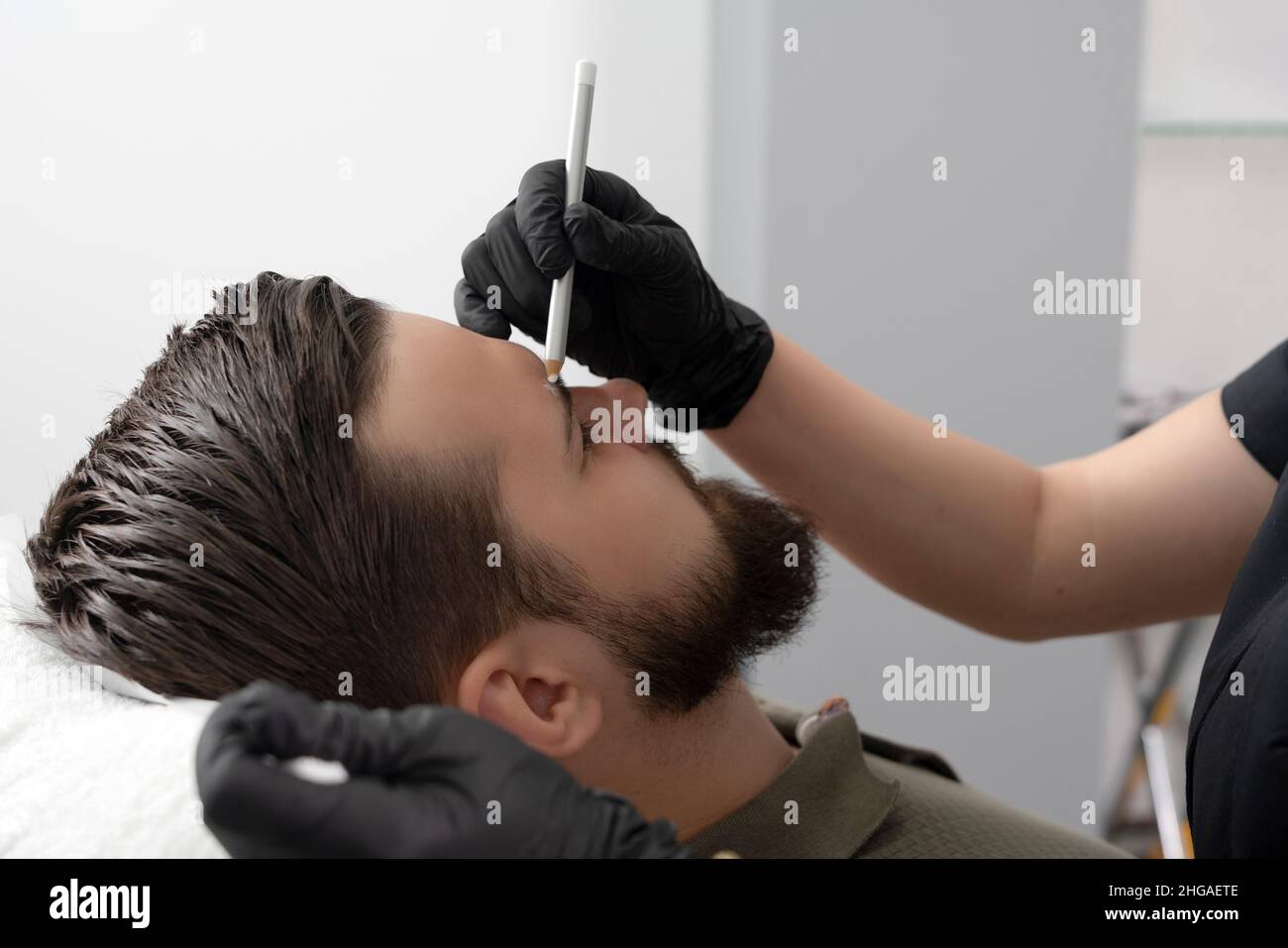 Man face surgery marks hi-res stock photography and images - Alamy