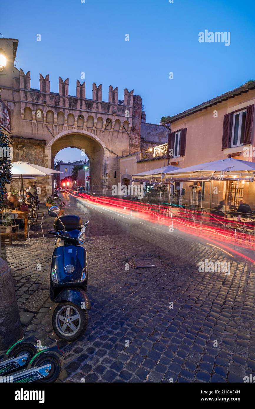 Trastevere Rome Italy at night. View of an Italian Vespa motorcycle on ...