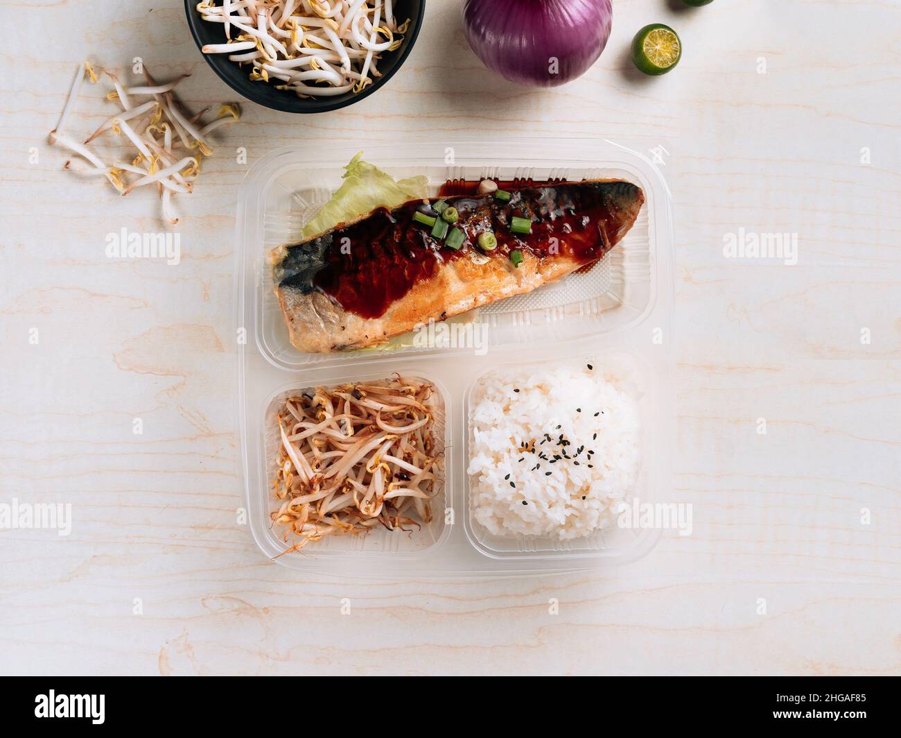 Japanese saba grilled fish set with rice top view on wood background ...