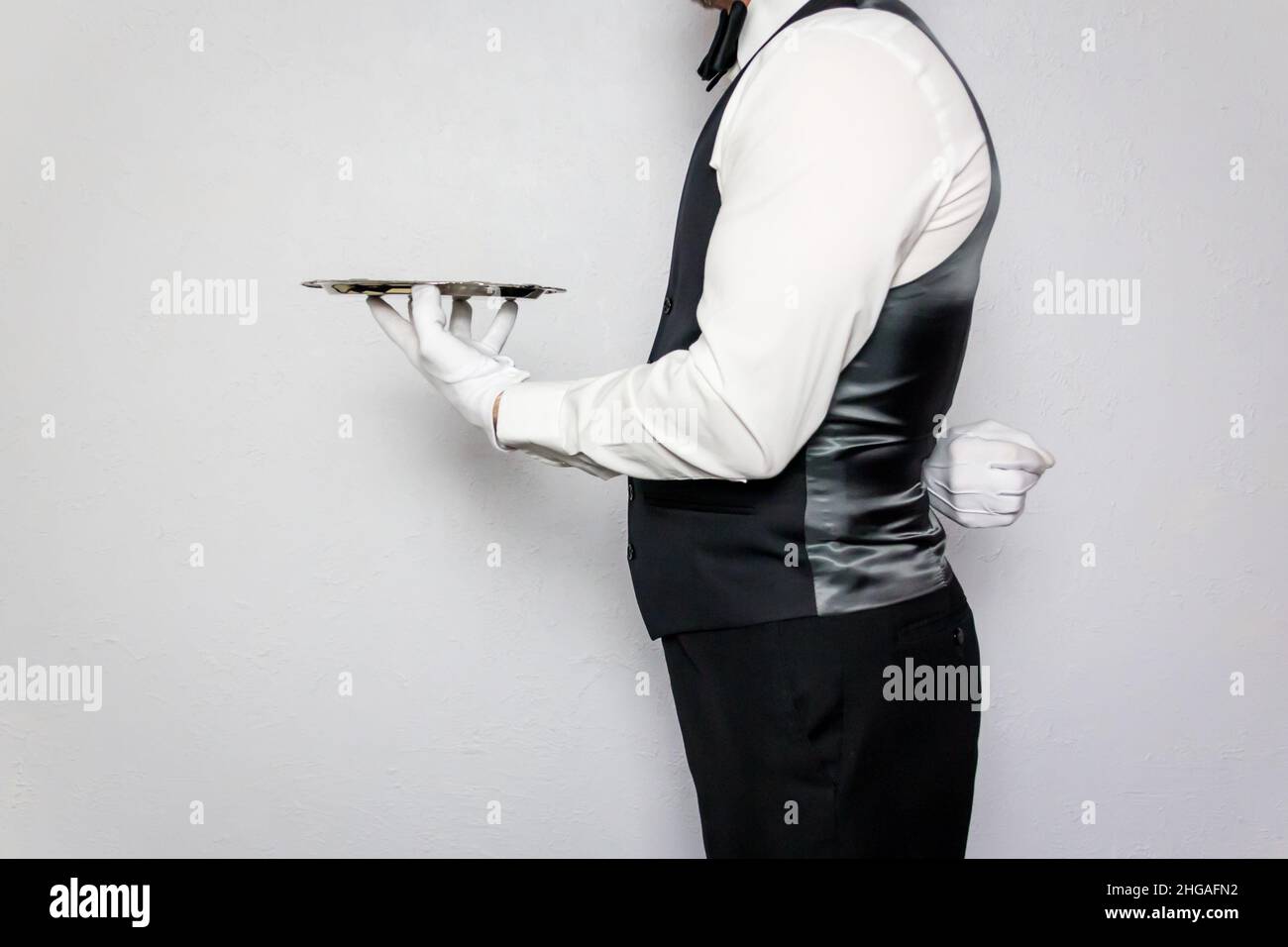 Vintage waiter uniform hi-res stock photography and images - Alamy