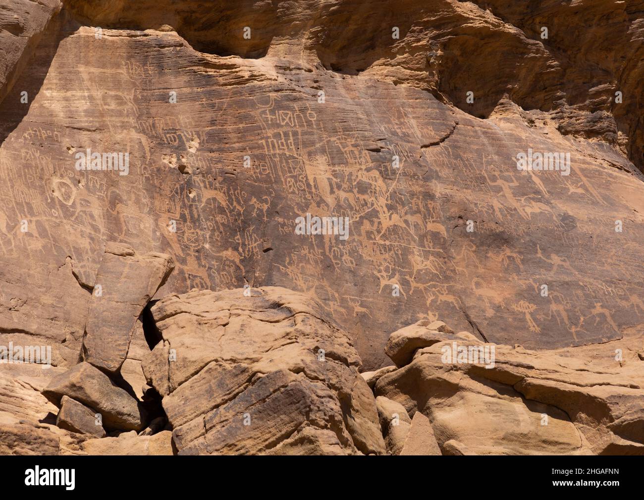 Petroglyphs on a rock depicting hunters, Najran Province, Thar, Saudi ...