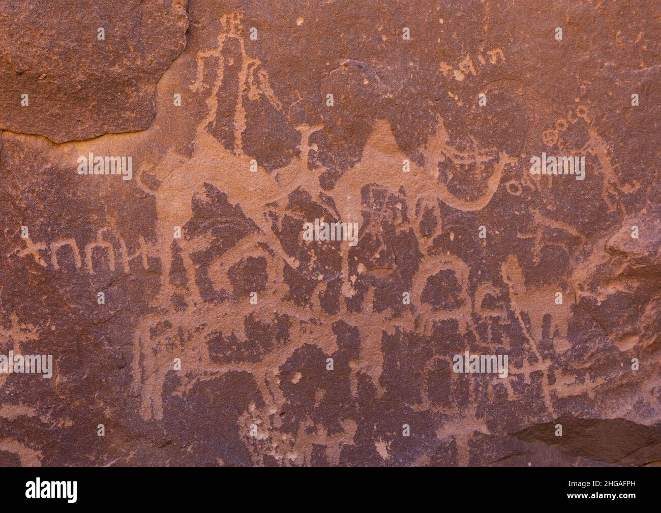 Prehistoric petroglyphs inscriptions bir hima hi-res stock photography ...