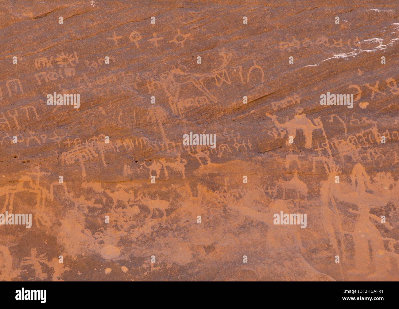 Prehistoric petroglyphs inscriptions bir hima hi-res stock photography ...