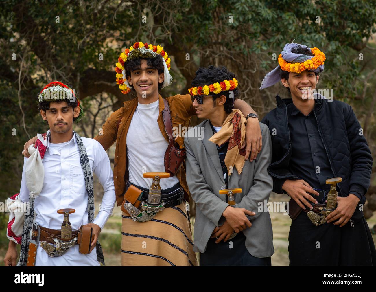 Portrait of flower men wearing floral crowns, Asir province, Sarat ...