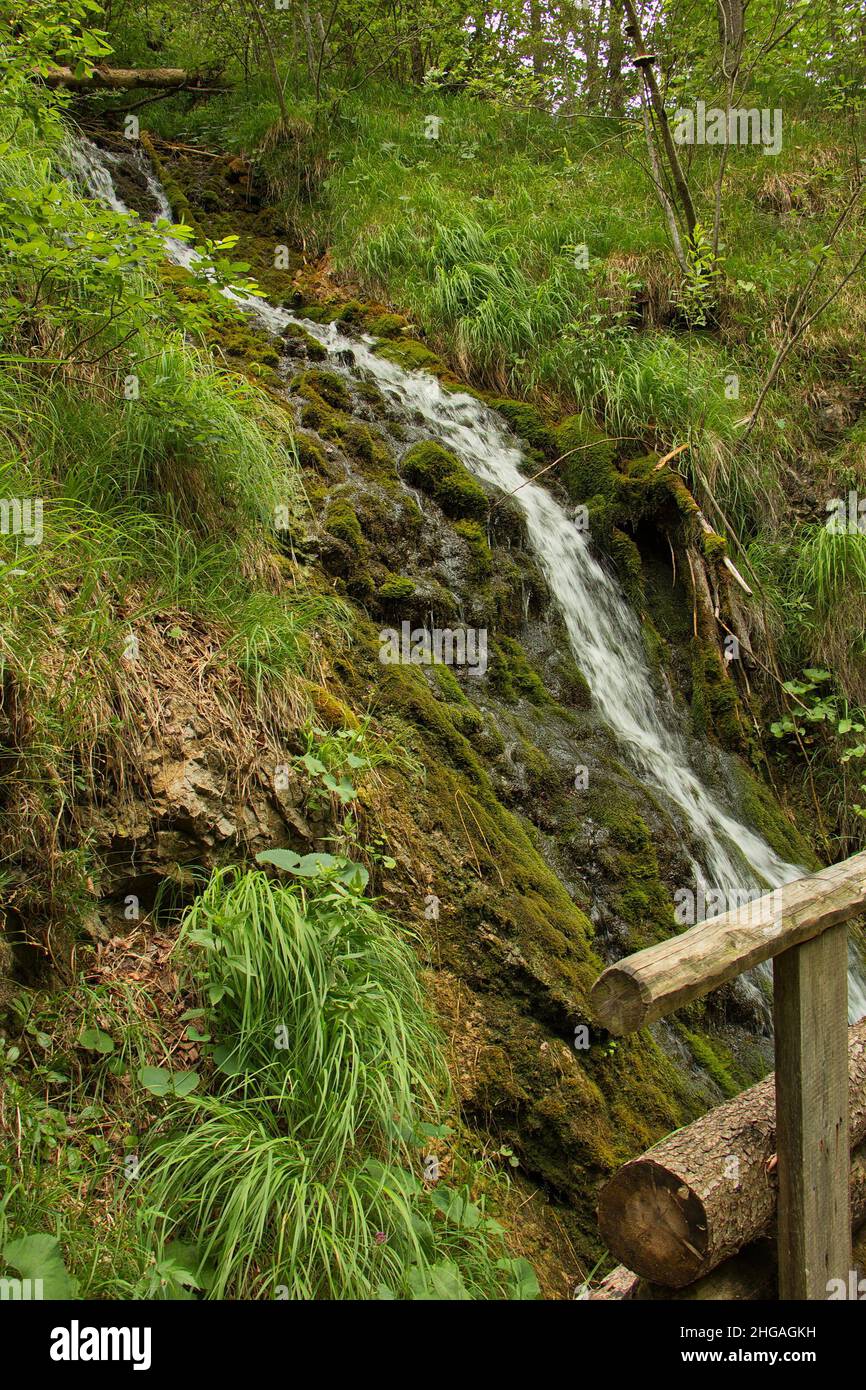 Small waterfall at the hiking trail in Oetschergraben near to the ...