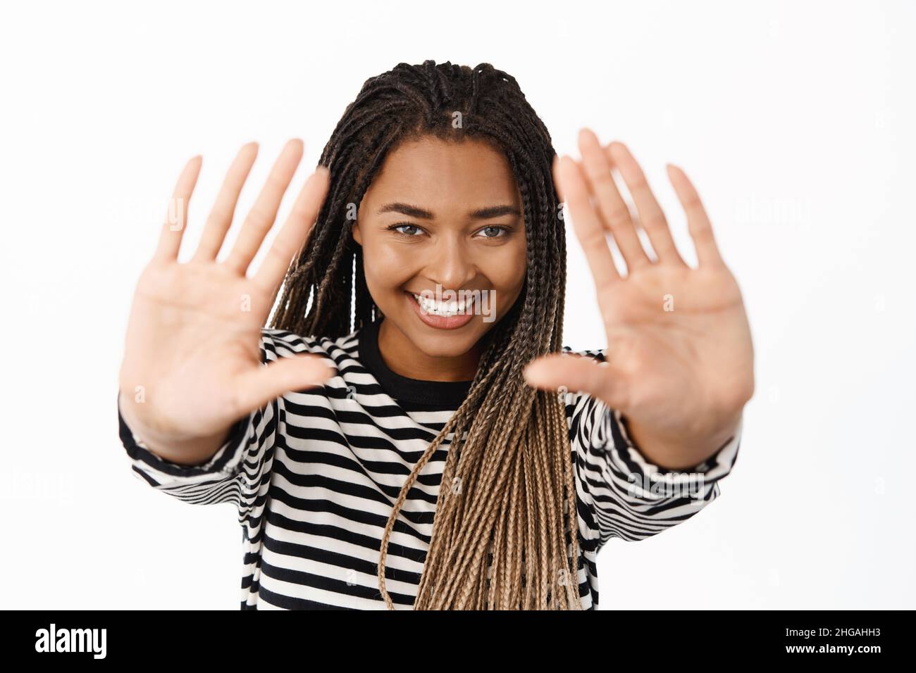 Image of smiling black woman imaging, picturing moment, looking through ...