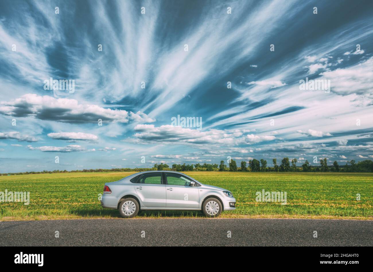 Volkswagen Polo Car Parking On A Roadside Of Country Road On A ...