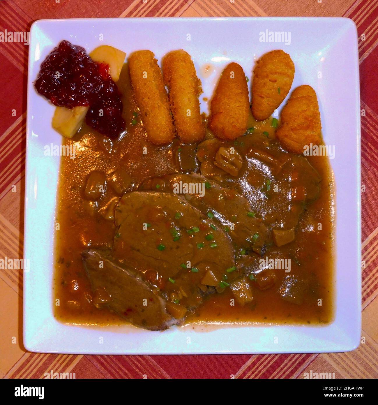 Roast venison with potato croquettes,a traditional meal in Austria ...