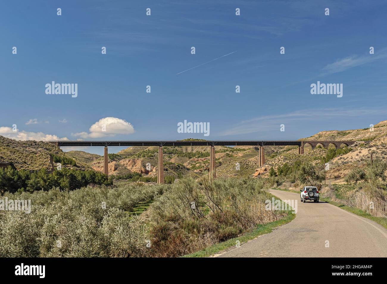 Train bridge over the valley and the Becerra road, Granada Stock Photo ...