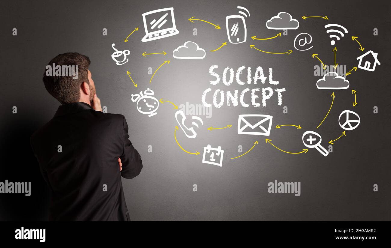 businessman drawing social media icons Stock Photo - Alamy