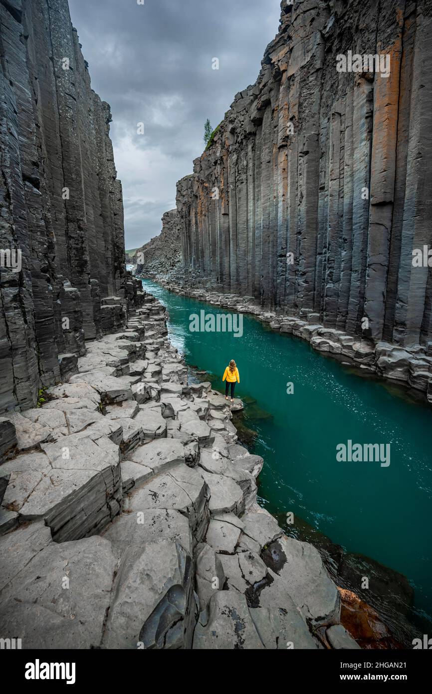 Tourist at Stuolagil Canyon, basalt columns, Egilsstadir, Iceland Stock ...