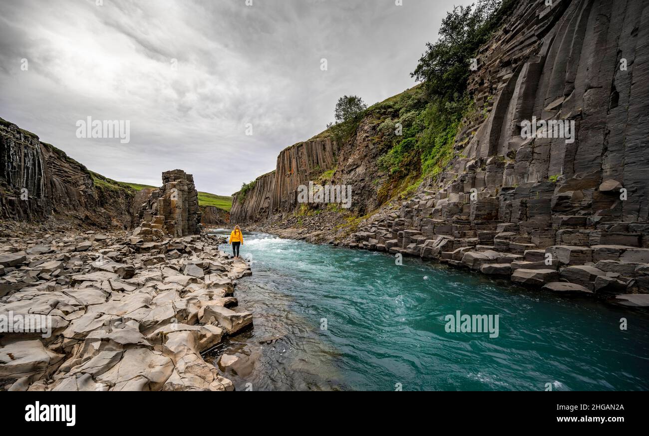 Tourist at Stuolagil Canyon, basalt columns, Egilsstadir, Iceland Stock ...