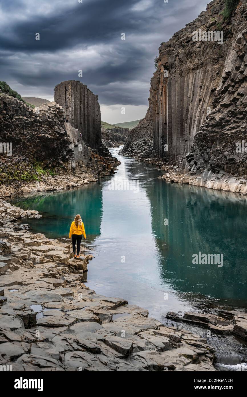 Tourist at Stuolagil Canyon, basalt columns, Egilsstadir, Iceland Stock ...