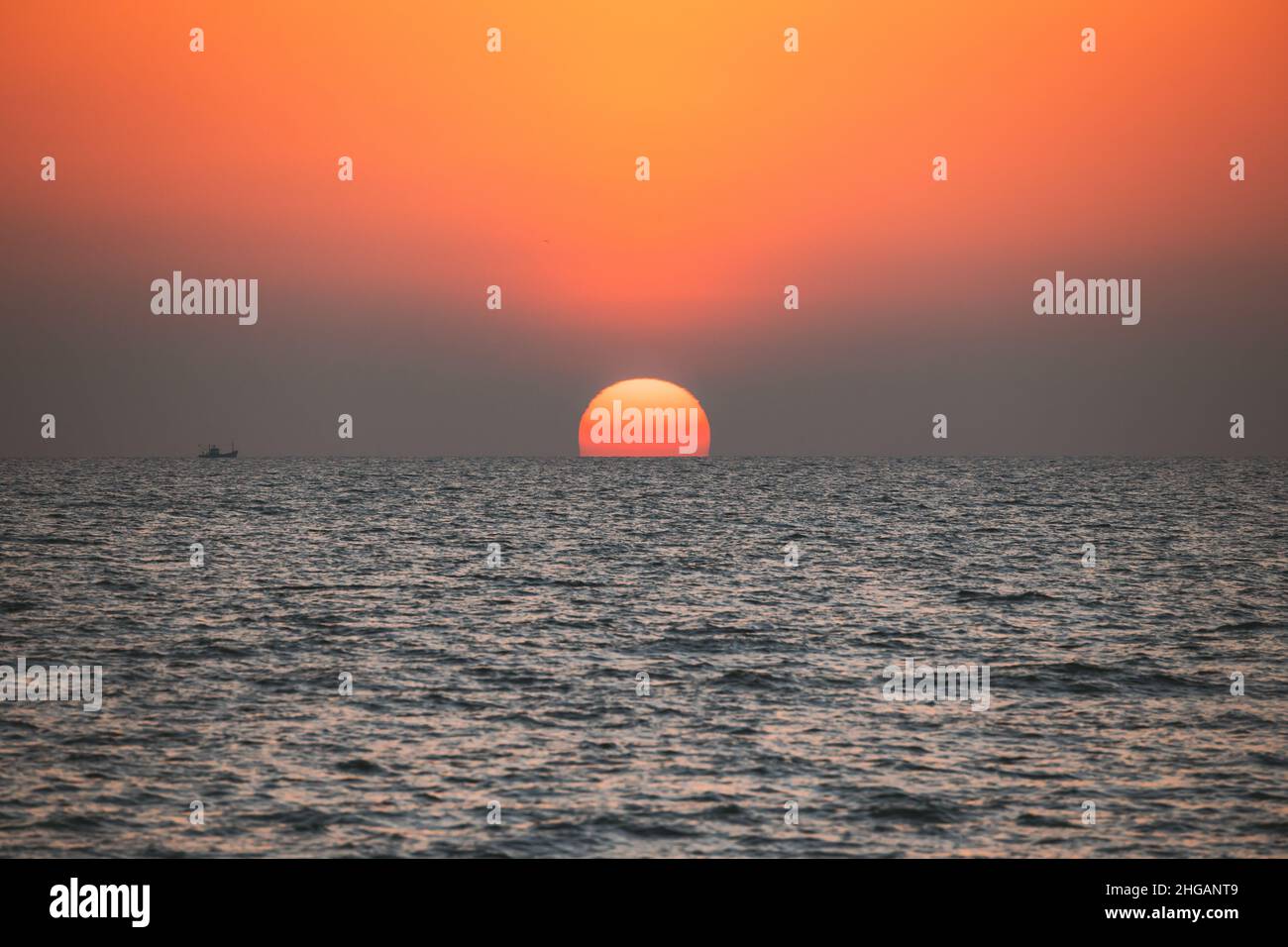 Sundown Above Sea Horizon At Sunset. Natural Sunrise Sky Warm Colors ...