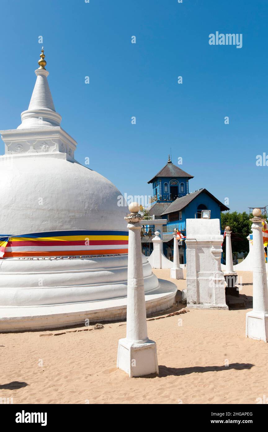 Buddhism and Hinduism, Tondeswaram temple, white dagoba, stupa, blue ...