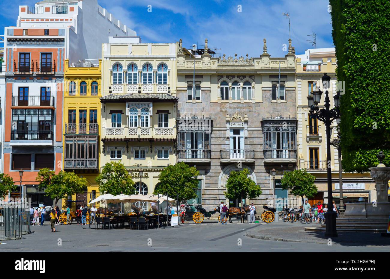Typical urban street scene and Plaza in Seville, Spain Stock Photo - Alamy