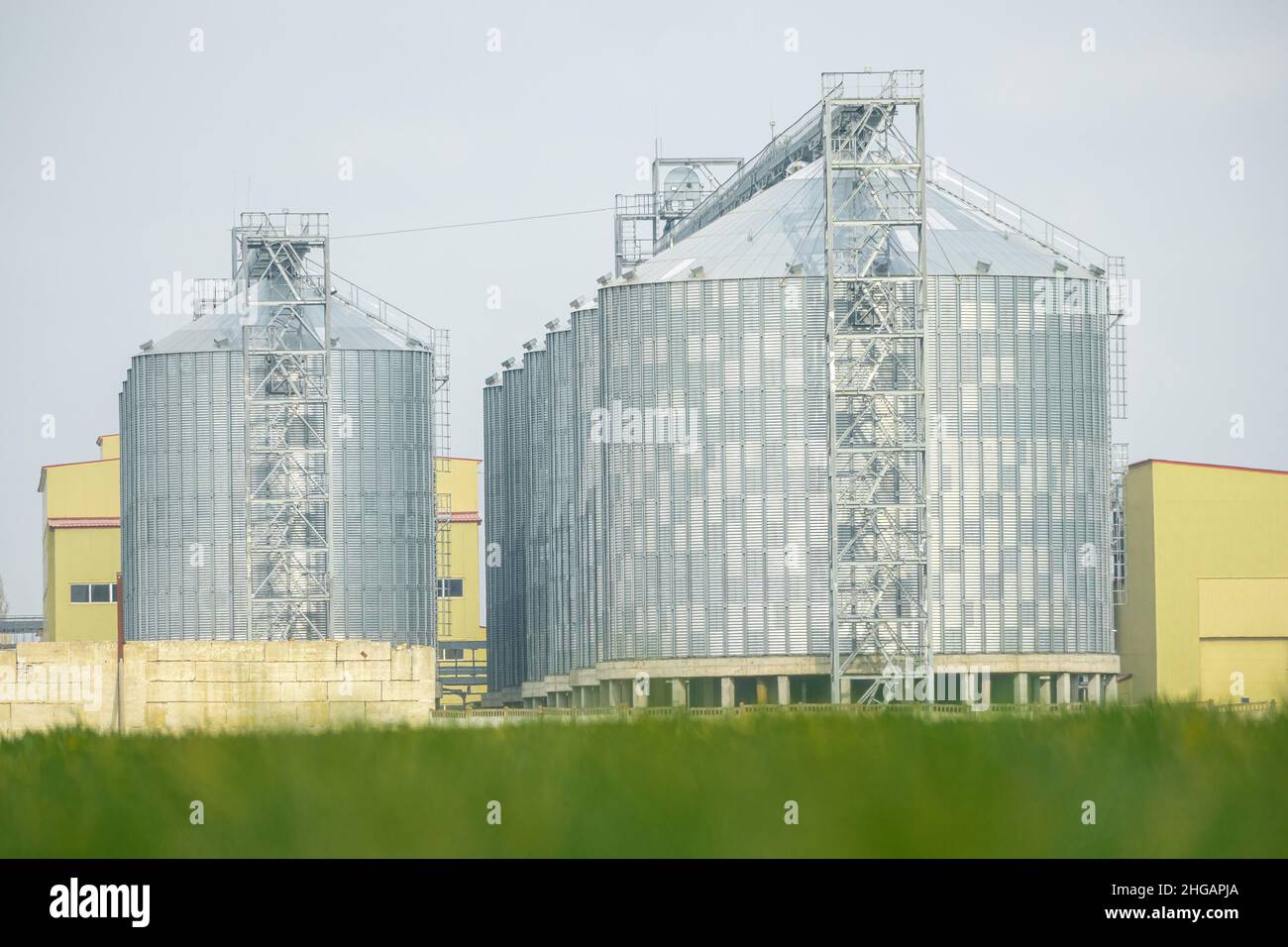 Grain elevator. Metal grain elevator in agricultural zone. Agriculture storage for harvest ...