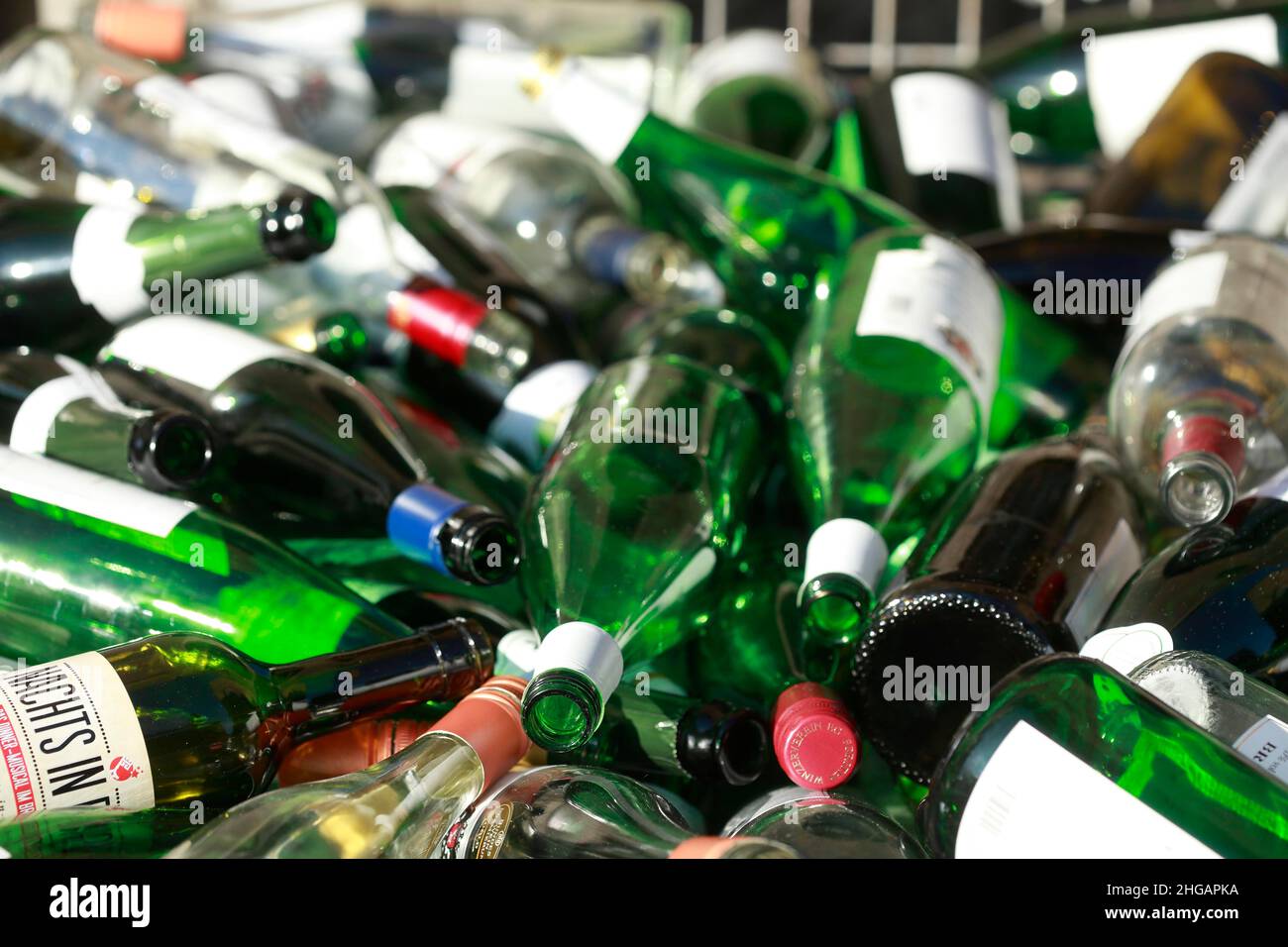 Empty wine bottles in a waste glass container, Germany Stock Photo - Alamy