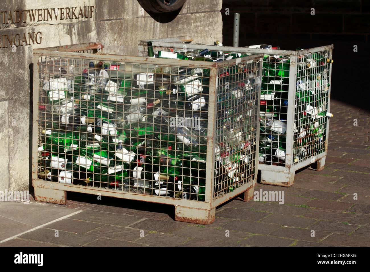 Empty wine bottles in a waste glass container, Germany Stock Photo - Alamy
