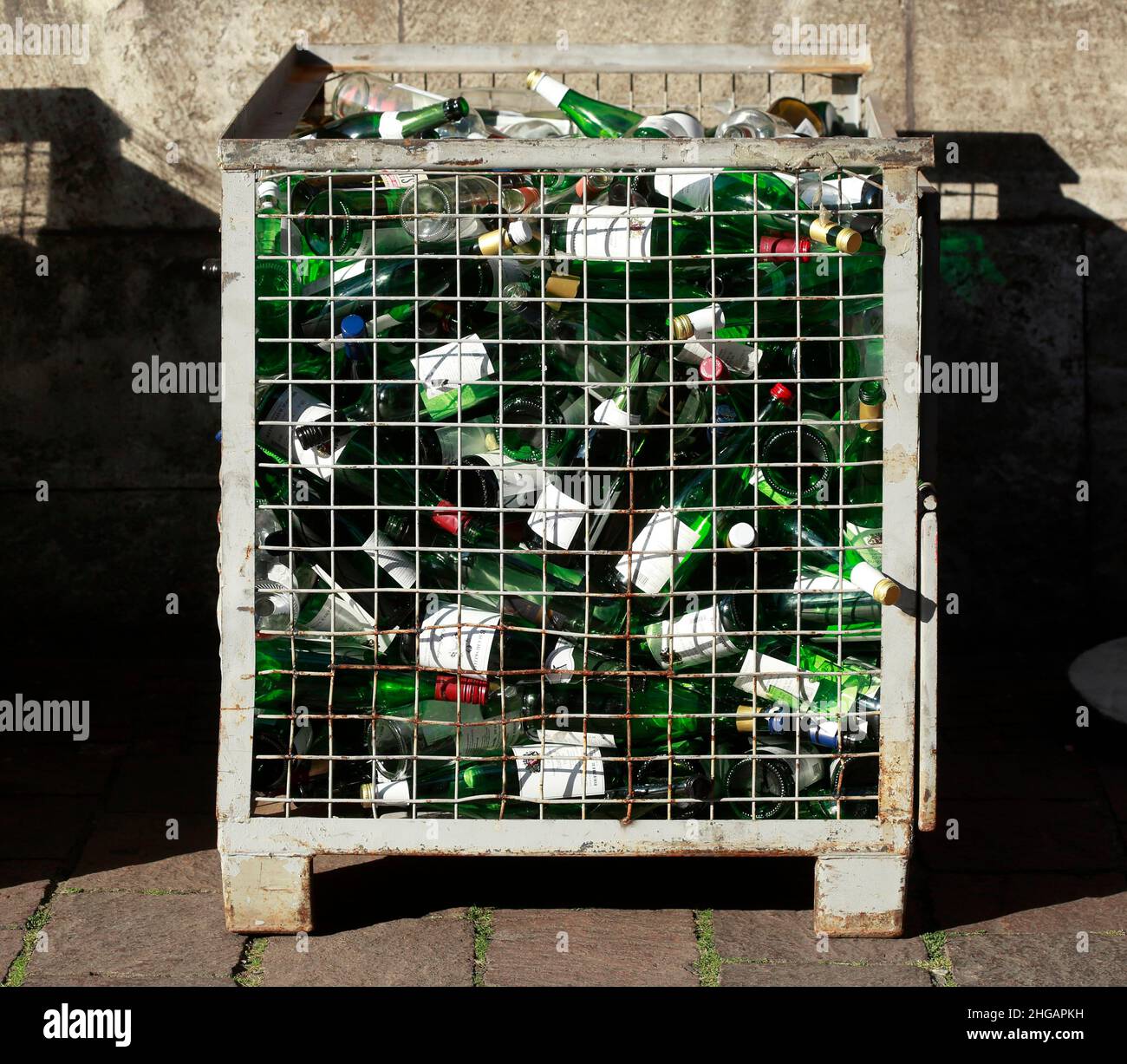 Empty wine bottles in a waste glass container, Germany Stock Photo - Alamy