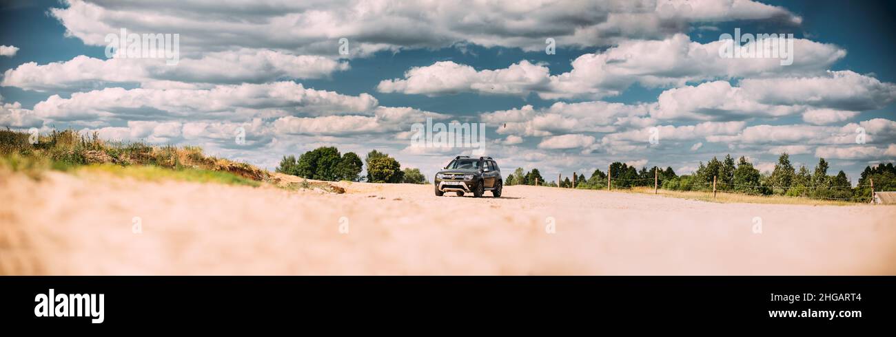 Renault Duster or Dacia Duster SUV in countryside landscape. Duster ...