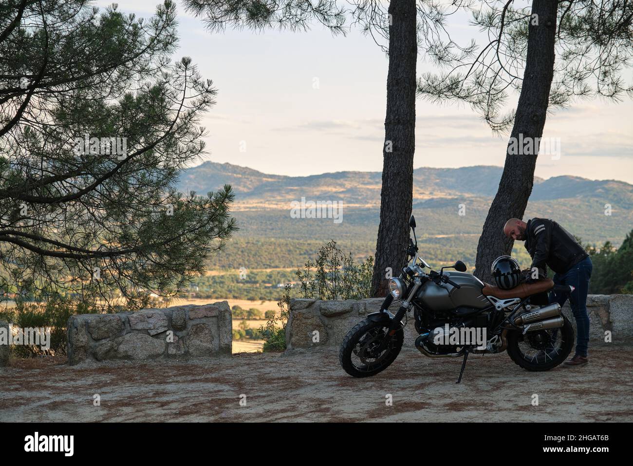 Alone man traveling alone on a motorcycle on a mountain road Stock ...