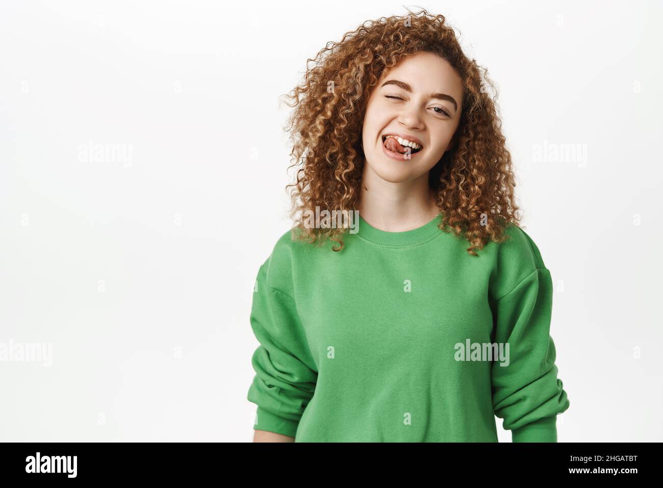 Portrait of beautiful curly young woman 25 years old, posing with happy ...