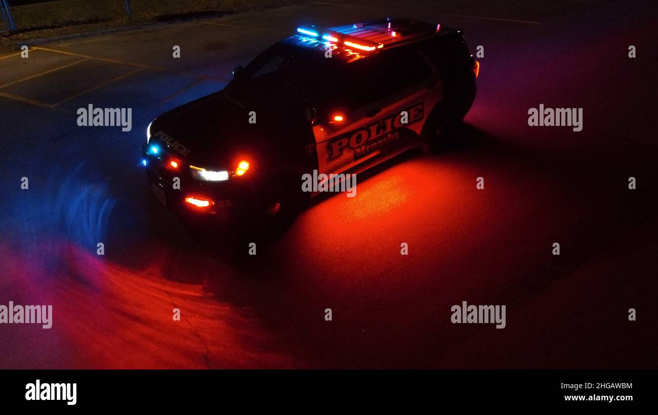 Police SUV at night with lights on Stock Photo - Alamy