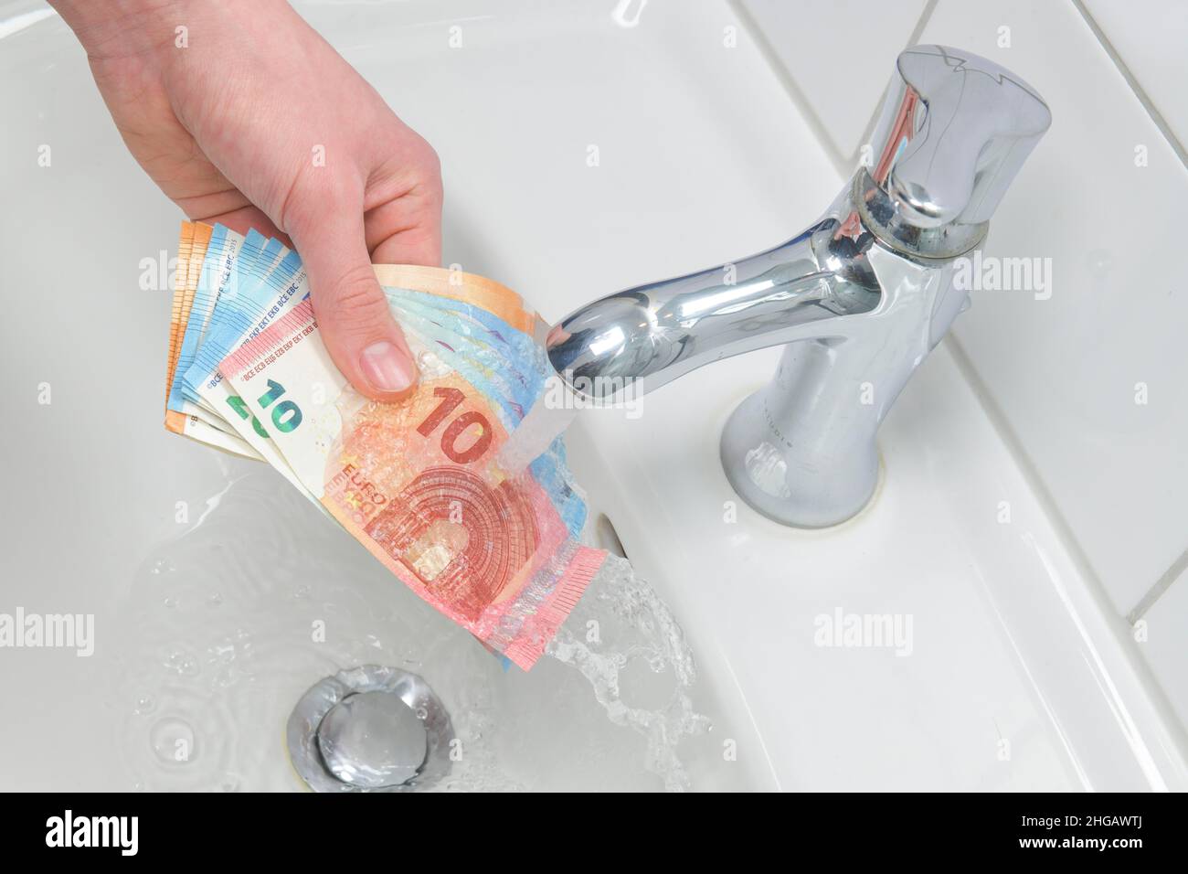 Tap, water, symbol photo water prices, money laundering Stock Photo - Alamy