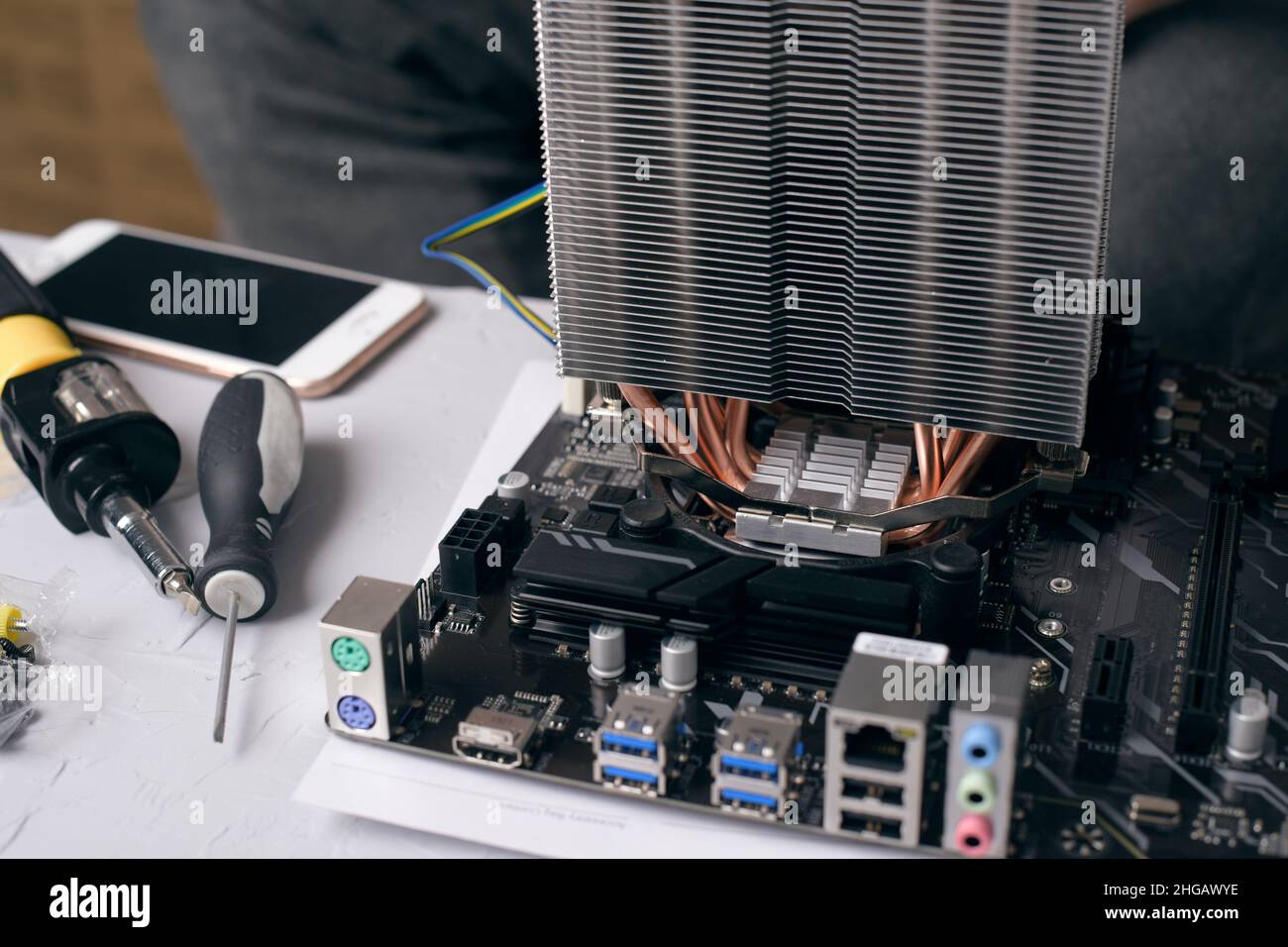 Close up. Young Man Repairing Motherboard from PC. Repair Shop. Worker ...