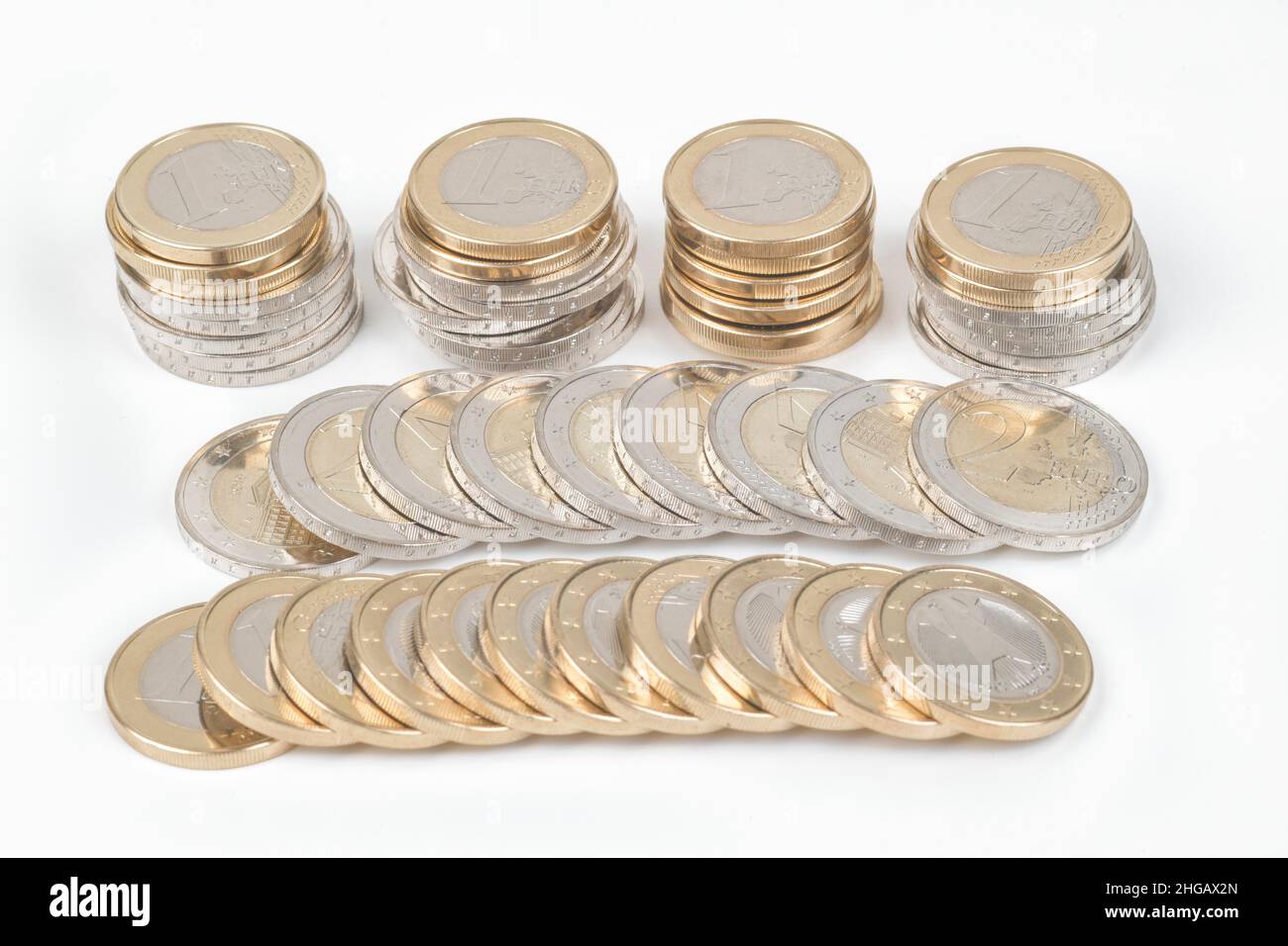 Stack of 1 and 2 euro coins, studio shot Stock Photo - Alamy