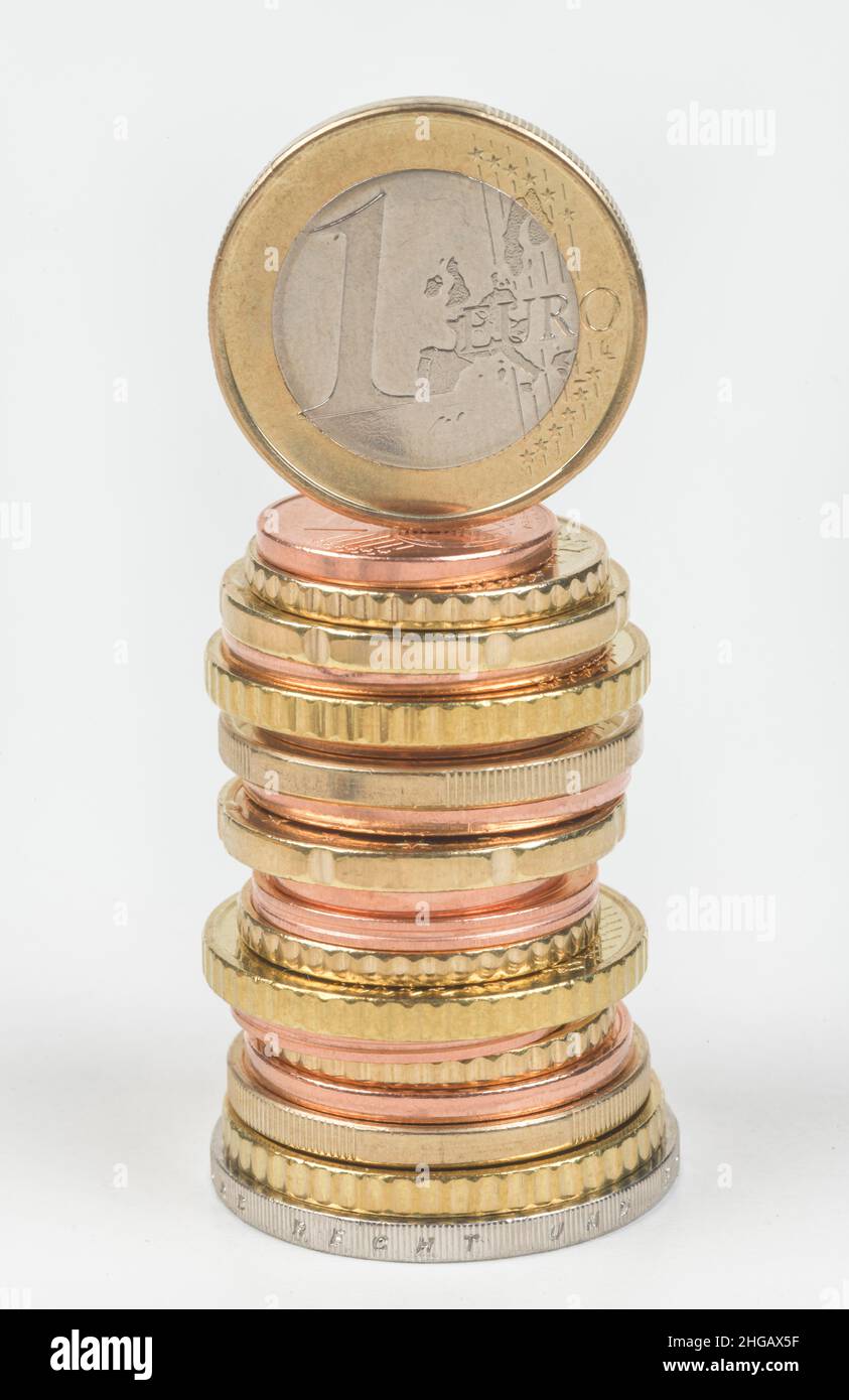 Stack of cent coins and euro coins, studio shot Stock Photo - Alamy