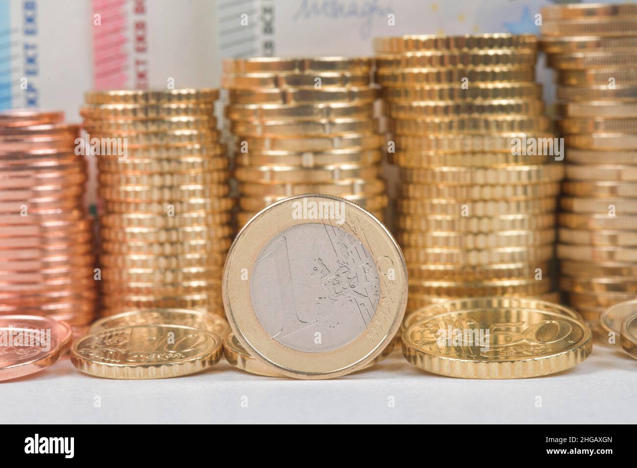 Stack of cent coins, euro coins, euro banknotes, studio shot Stock ...