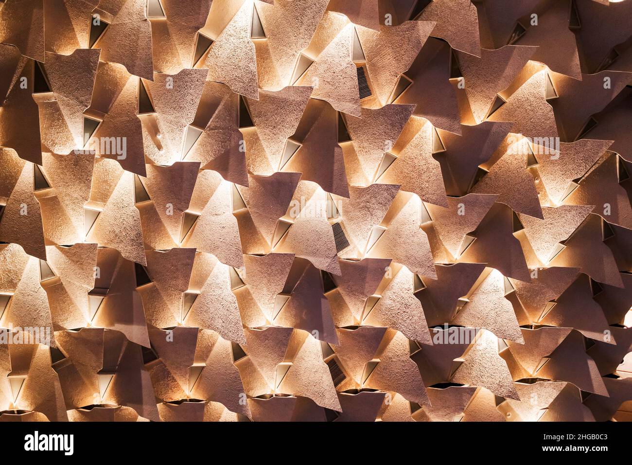 Decorative light lamps hanging on the ceiling of dark room as abstract ...