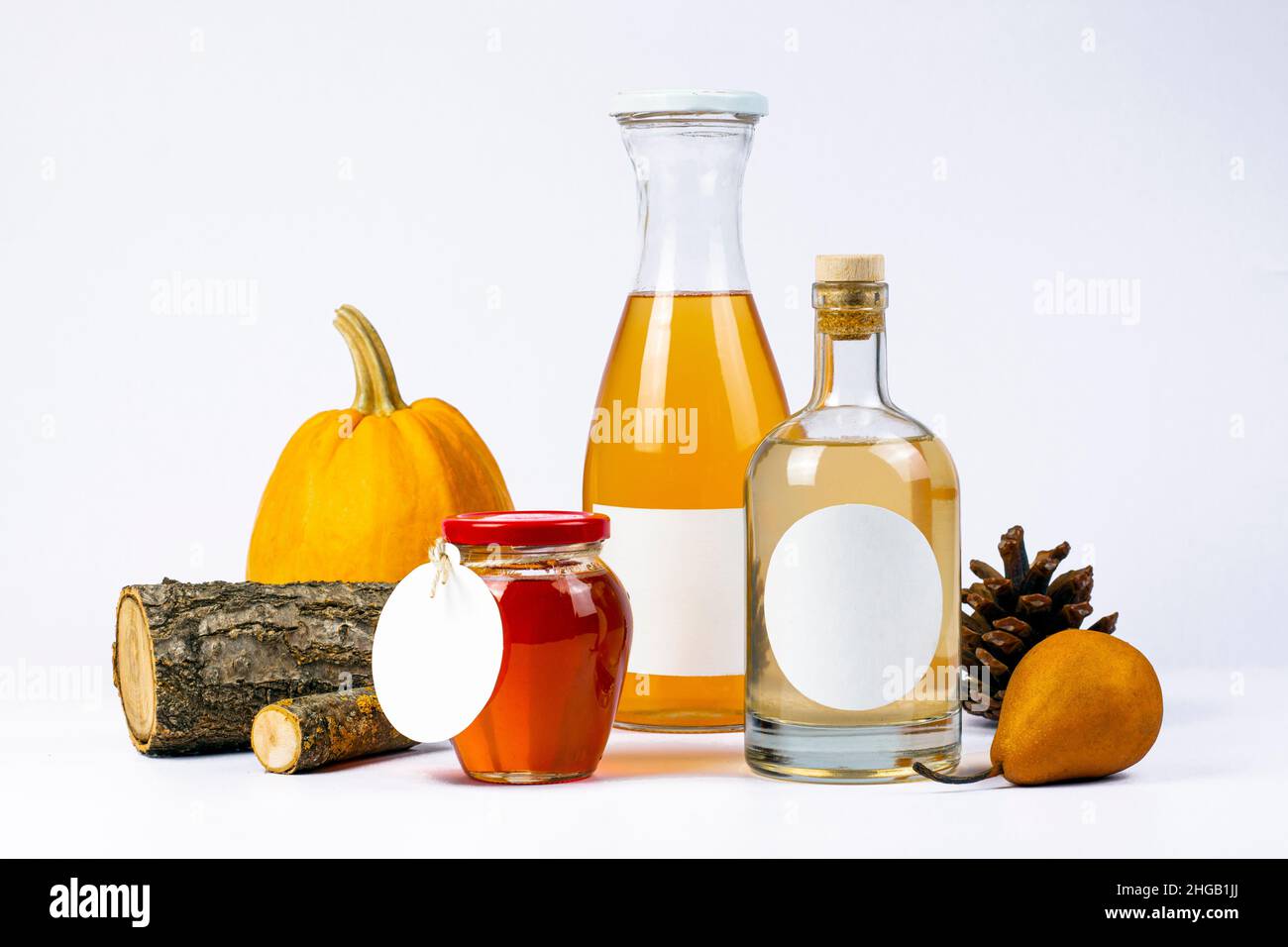 Homemade fruit juice, jam and alcohol. Transparent glass bottles and ...