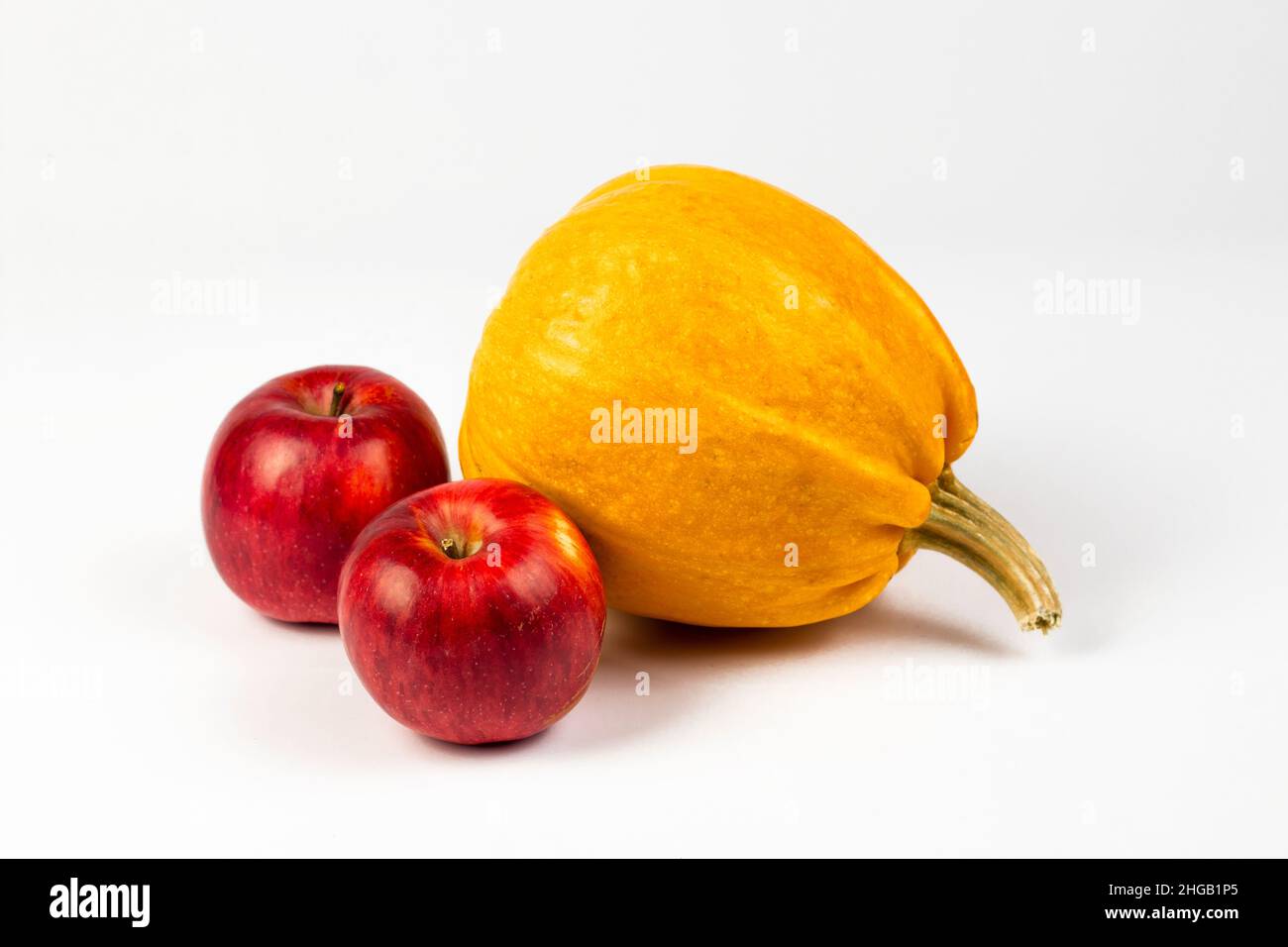 Pumpkin and red apples isolated on white background. Part of set Stock ...
