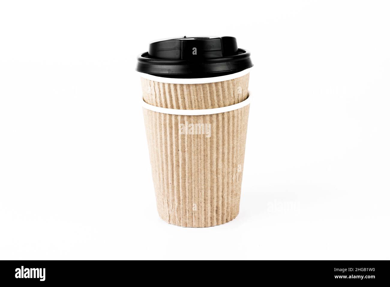 Used kraft paper coffee cup isolated on white background. Take away ...