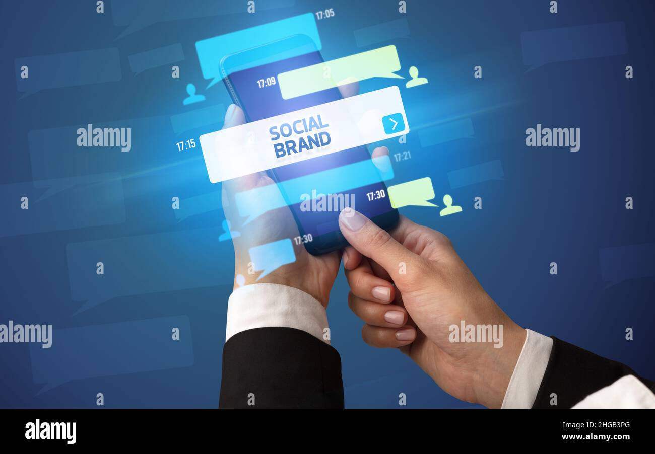 Hand using smartphone with social media concept Stock Photo - Alamy