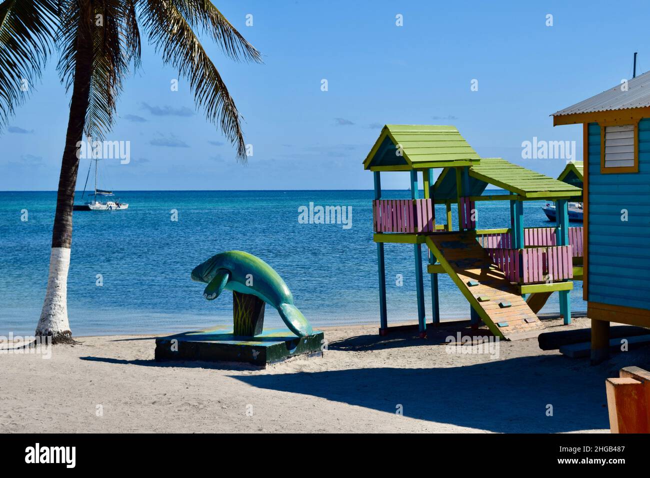 A colorful children's playground and play set on the beach overlooking ...
