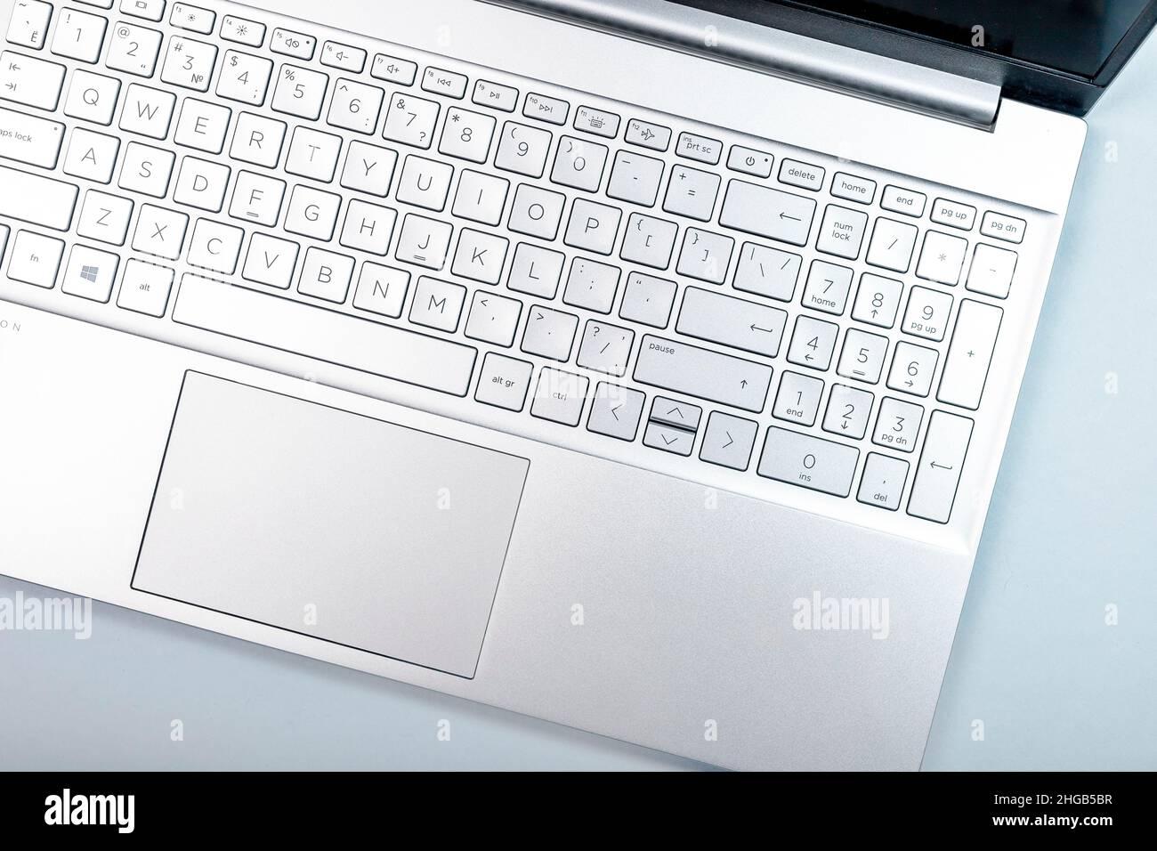 Keyboard of aluminum laptop. Key board of computer top view, closeup ...
