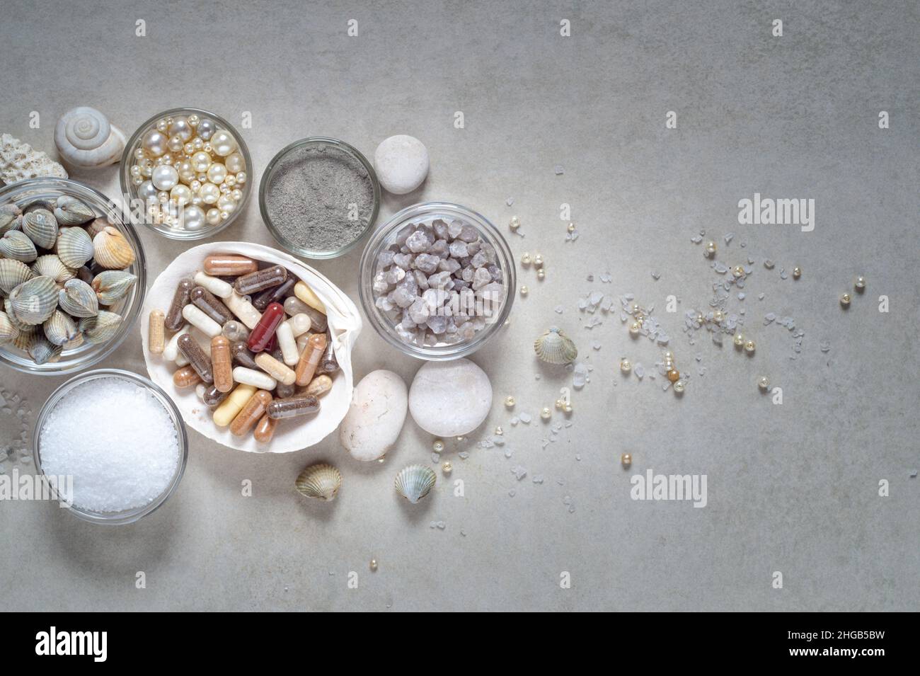 Dietary supplements or medicines from sea minerals in capsules, salt ...