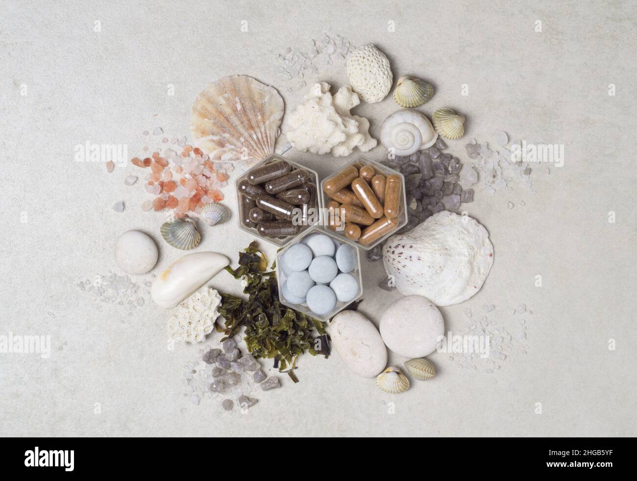 Dietary supplements or medicines from sea minerals in capsules, salt ...