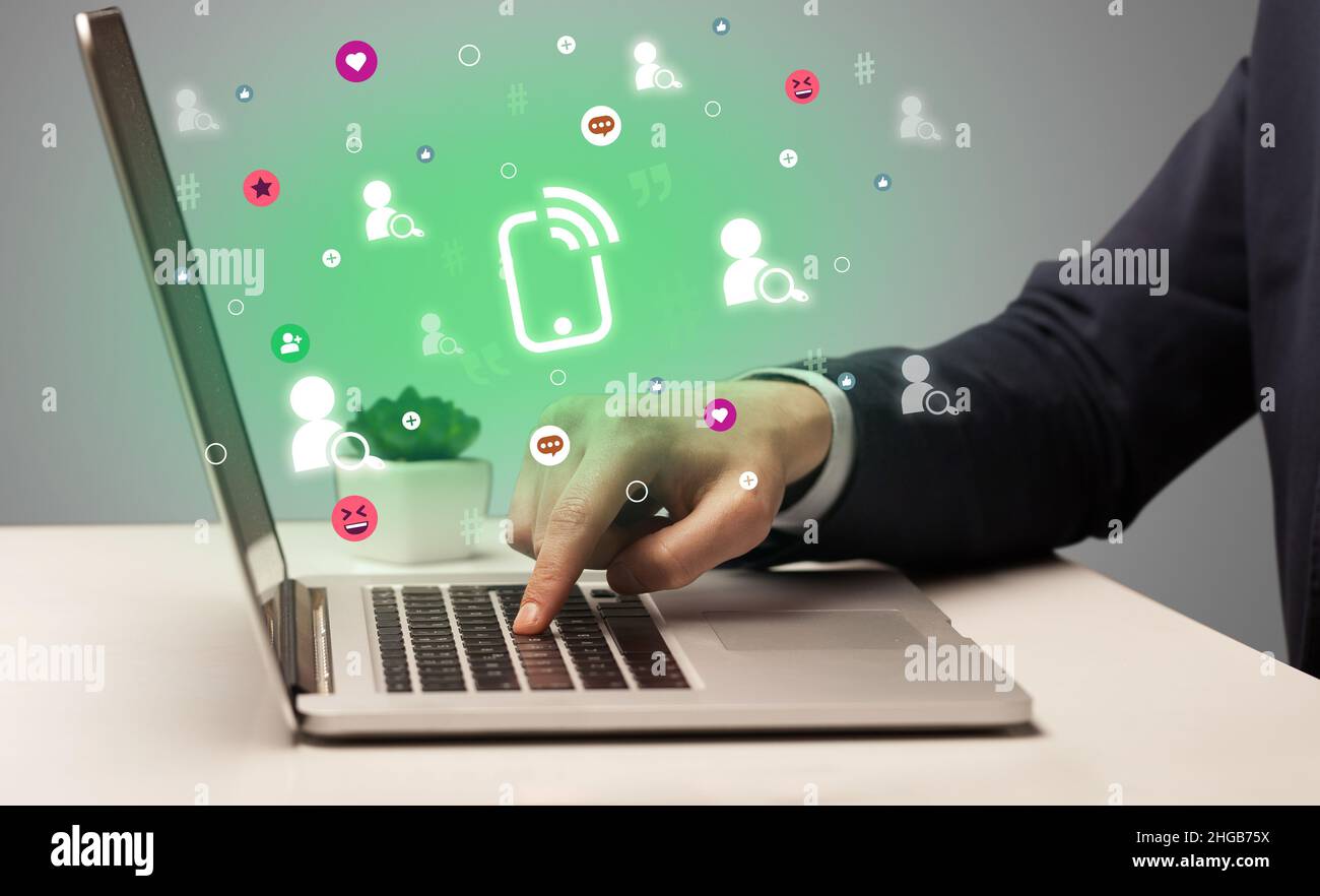 Hand surfing on the social media Stock Photo - Alamy