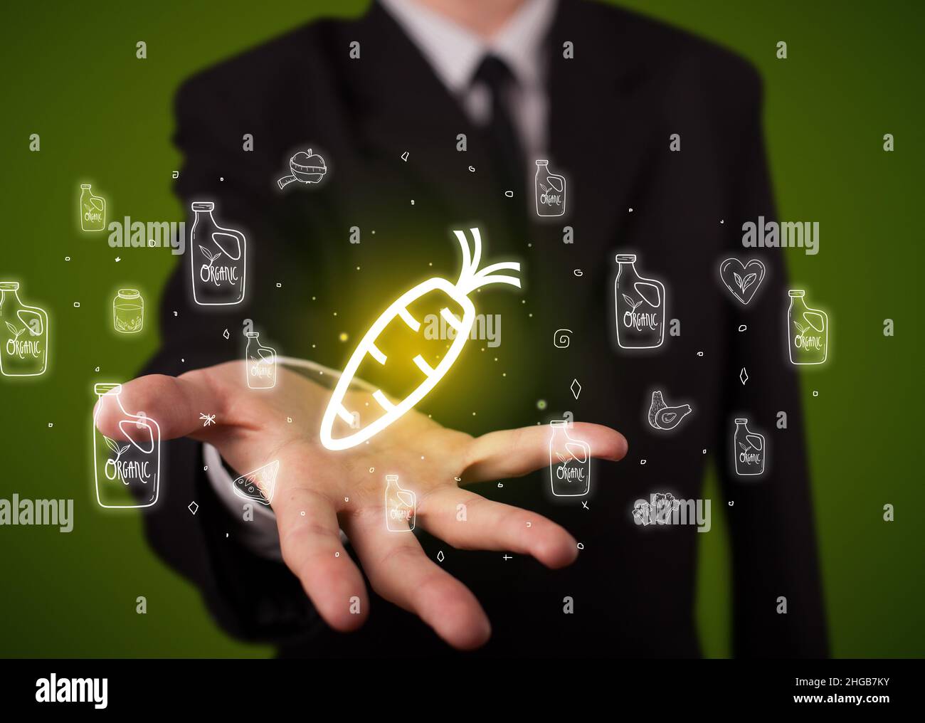 Hand holding food related icons Stock Photo - Alamy