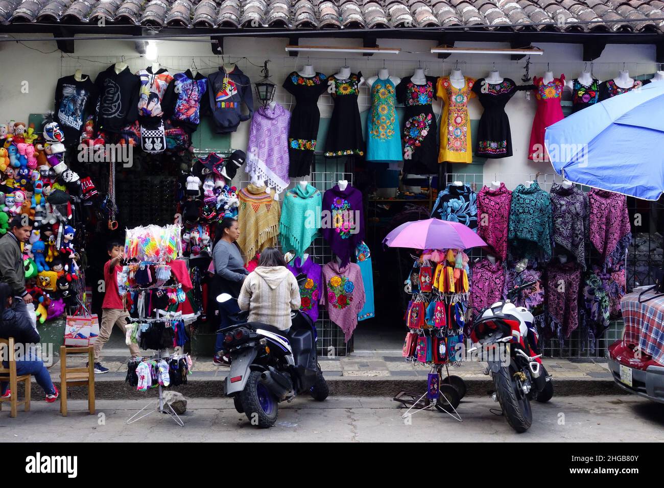Textile stall in the street market, mercado, San Cristóbal de las Casas ...