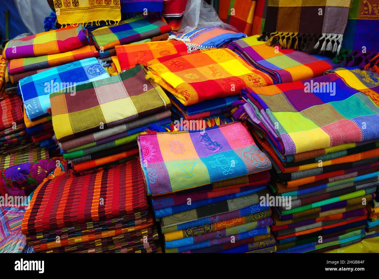 Textile stall in the street market, mercado, San Cristóbal de las Casas ...