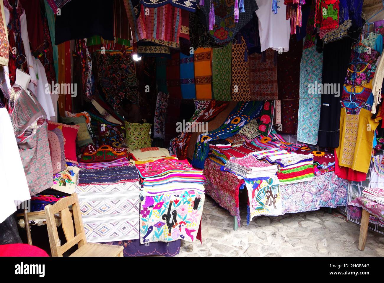 Textile stall in the street market, mercado, San Cristóbal de las Casas ...