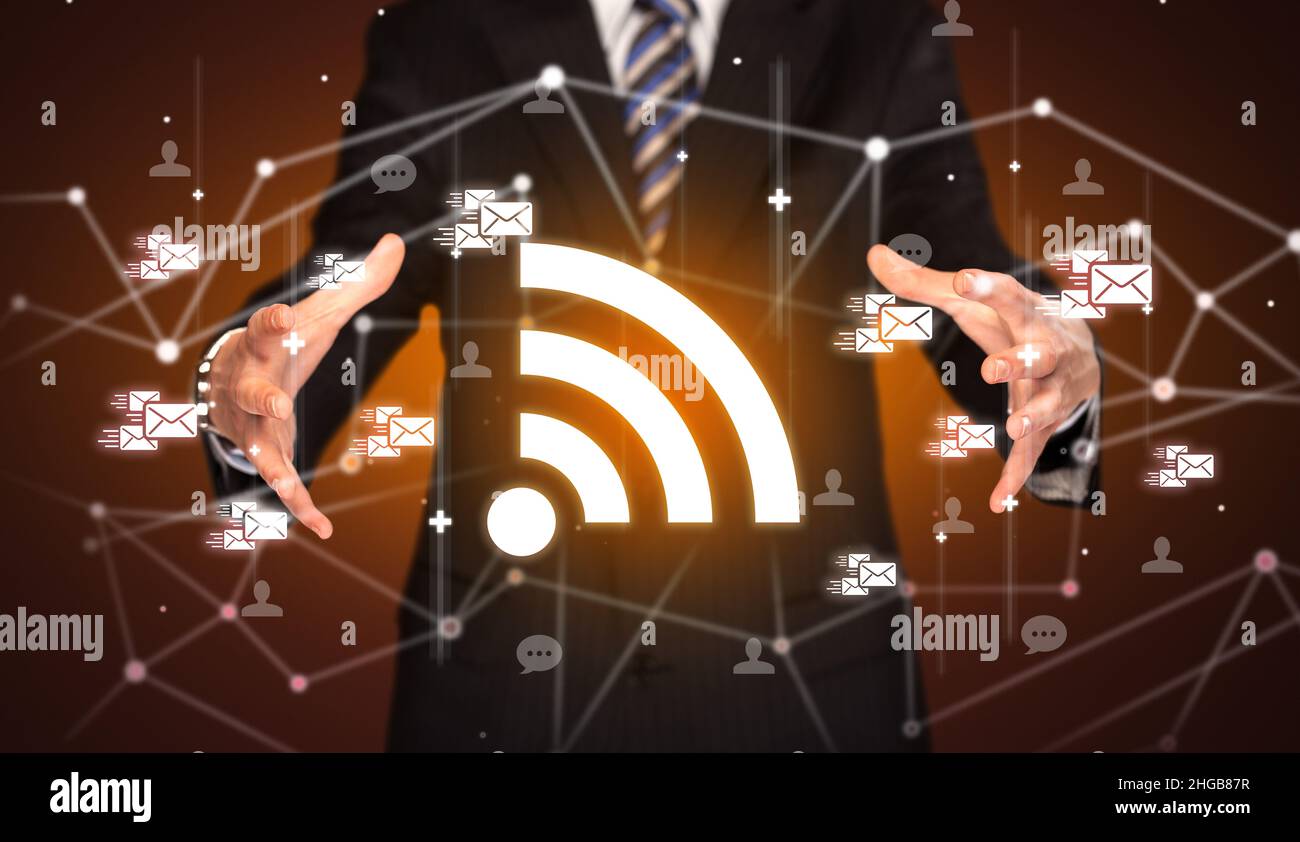 Hand holding social media icons Stock Photo - Alamy