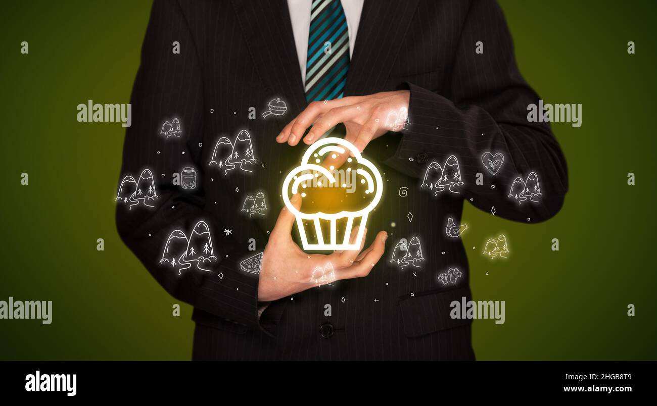 Hand holding food related icons Stock Photo - Alamy
